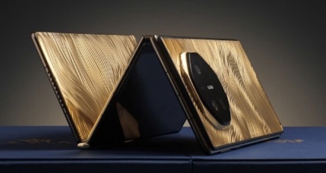 Huawei Mate XT Ultimate: Điện thoại gập ba bằng vàng 18K, giá hơn 2,5 ...